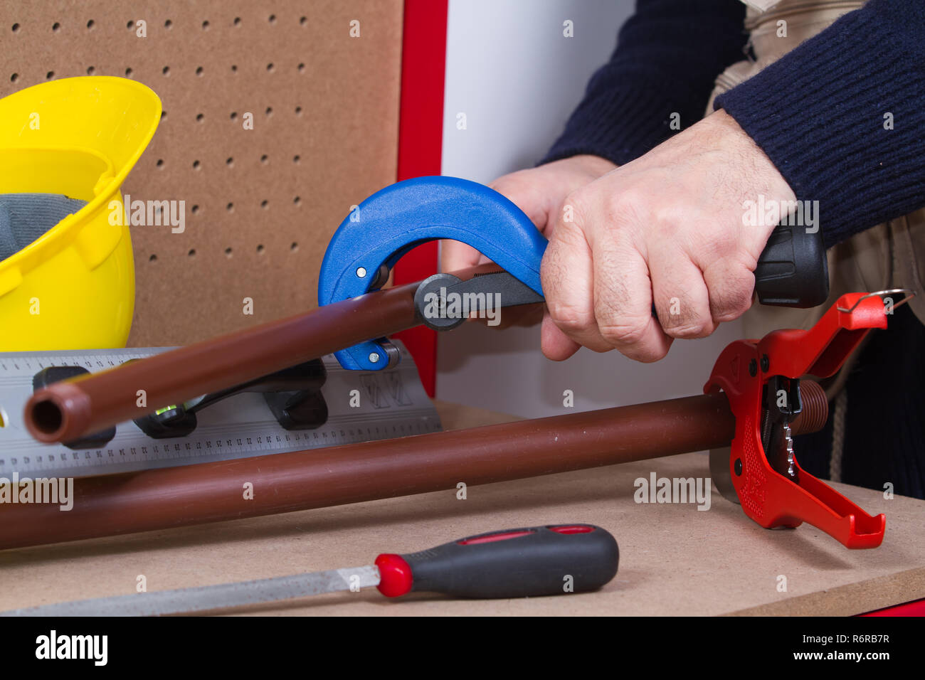 Handyman working on workbench tools hi-res stock photography and images ...