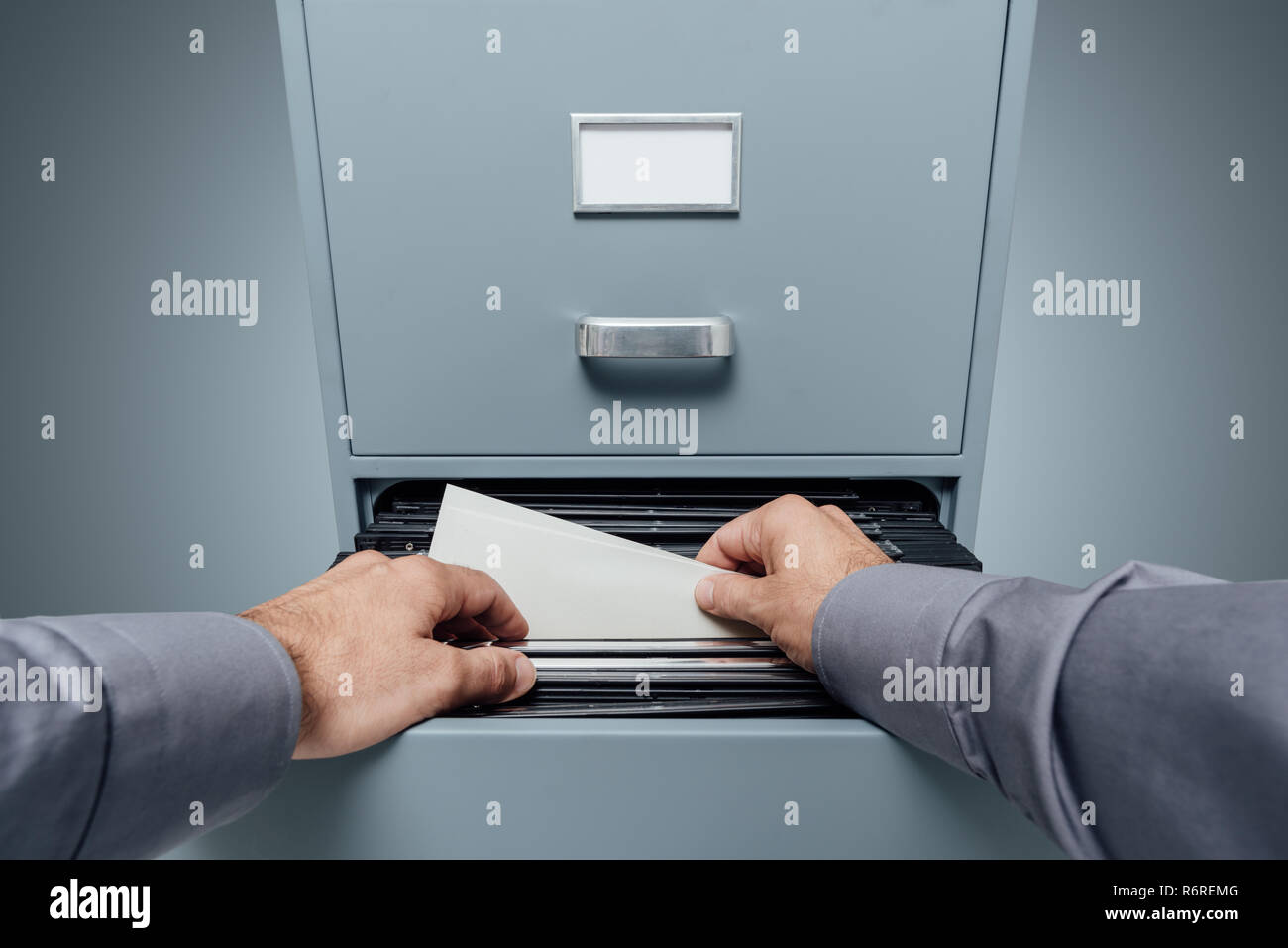 Man searching files work office hi-res stock photography and images - Alamy