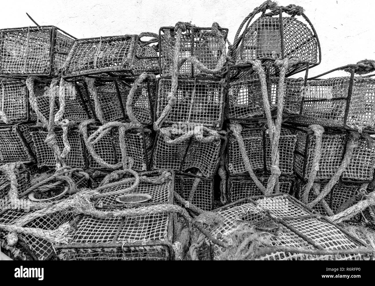 Fish cage in the bay Black and White Stock Photos & Images - Alamy
