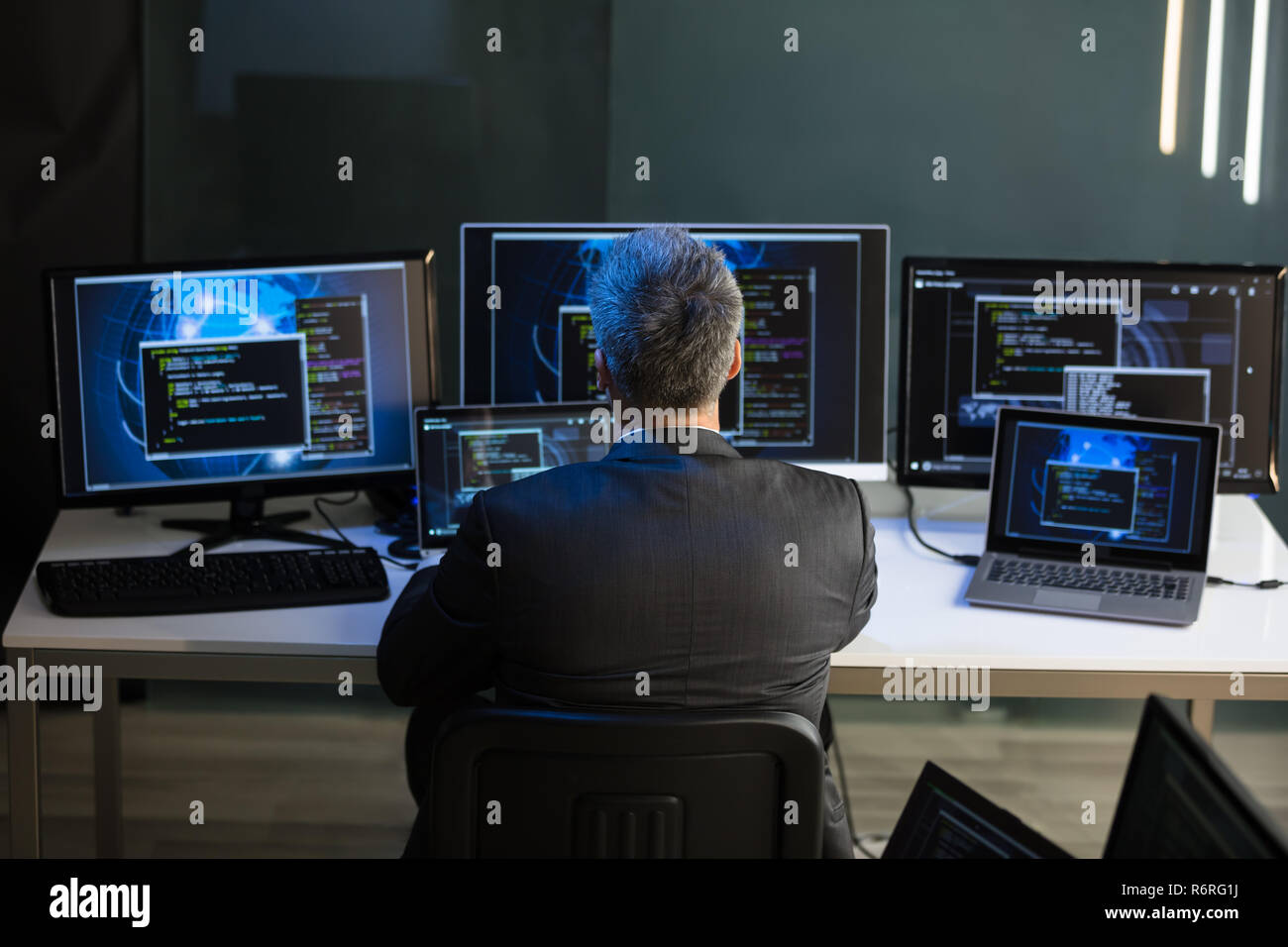 Multiple computers screens hi-res stock photography and images - Alamy