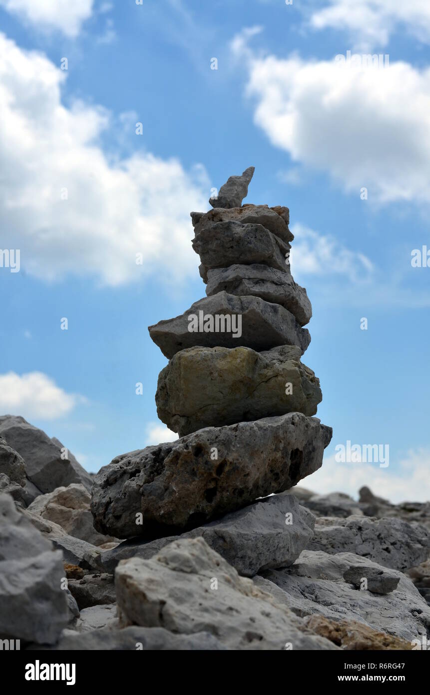 Pyramid of stones on the mountainside Stability and Equilibrium Stock ...