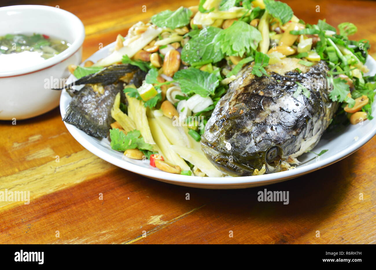 Chinese fish head soup hi-res stock photography and images - Alamy