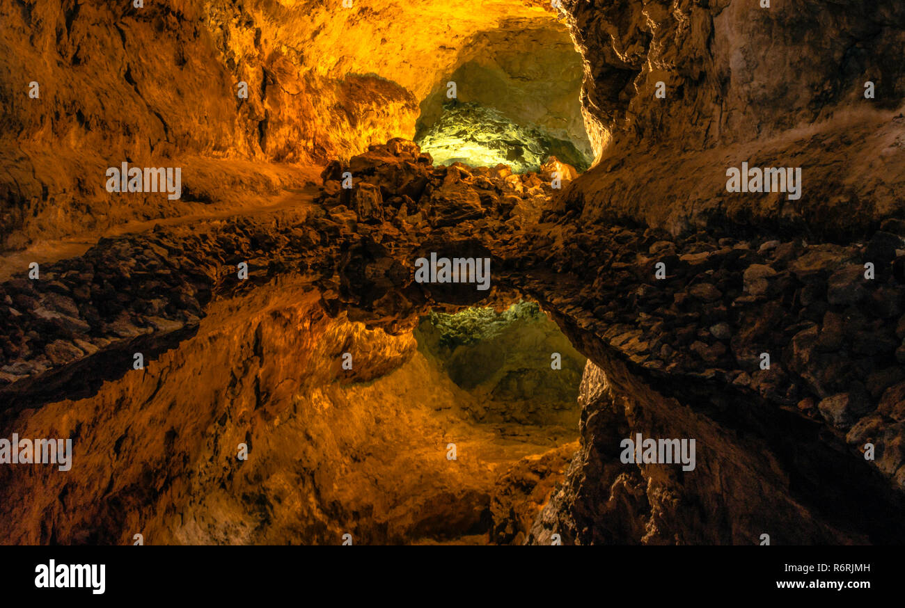 Underground lake inside volcanic cave Cueva de los Verdes Stock Photo ...