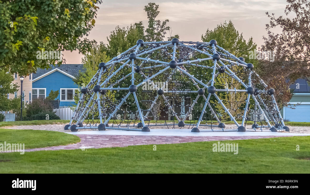 Rope climbing frame with a geodesic dome shape Stock Photo - Alamy