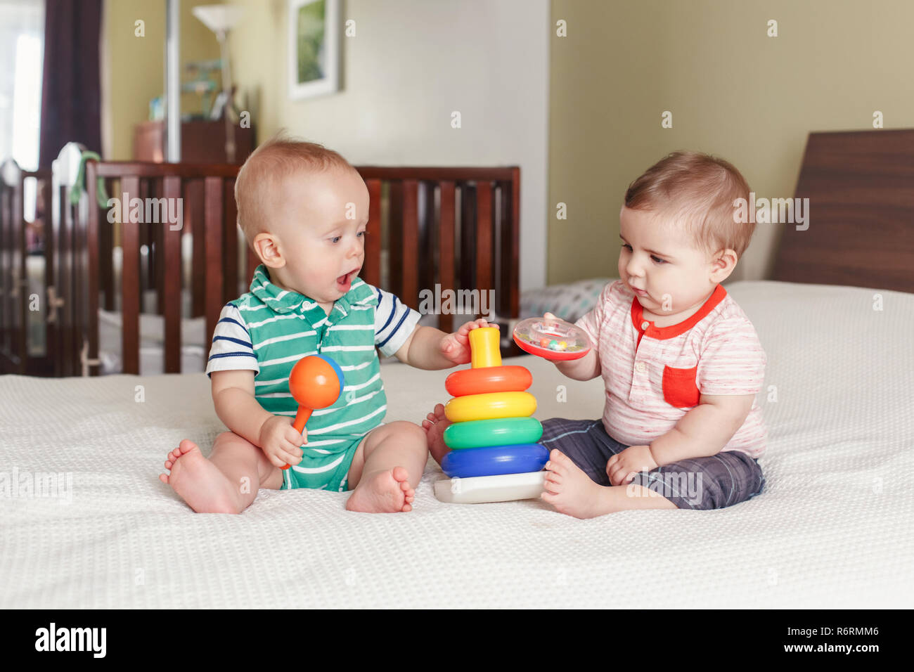 Adorable kids playing together blocks hi-res stock photography and ...