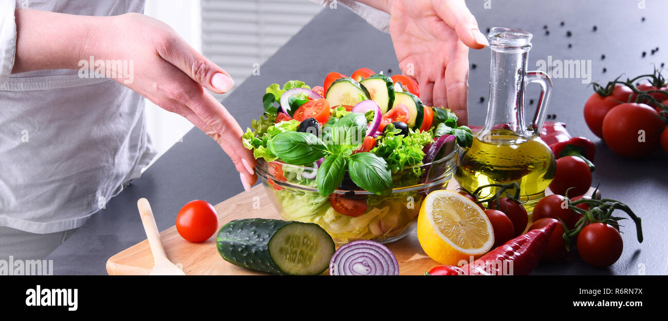 Preparation of a vegetable salad from fresh organic ingredients Stock ...