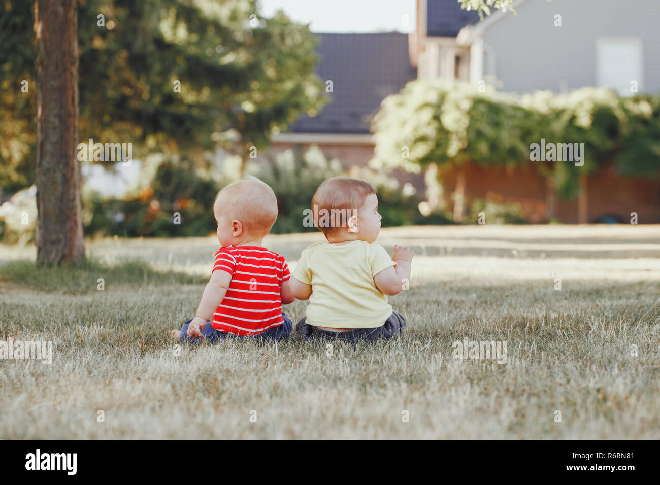 Child from behind white t shirt hi-res stock photography and images - Alamy