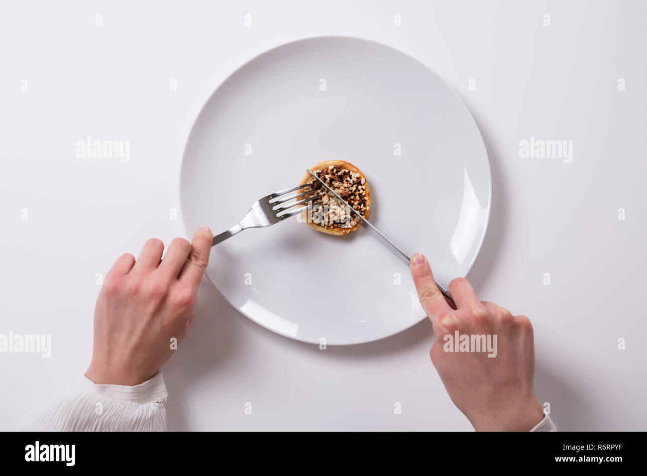 Woman's Hand With Fresh Food On Plate Stock Photo - Alamy