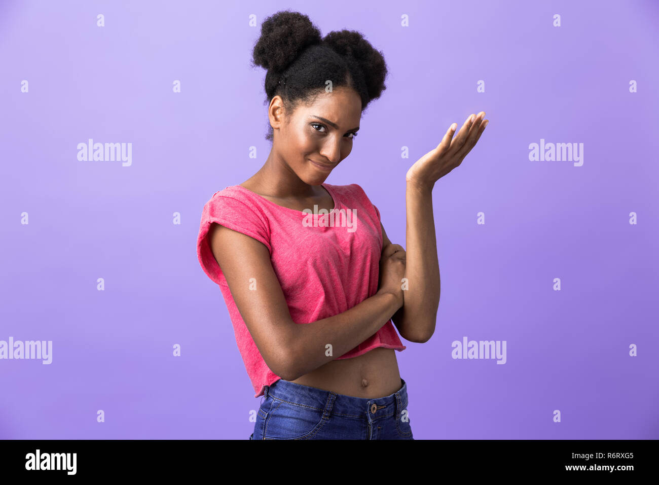 Photo of puzzled african american woman expressing perplexity isolated ...