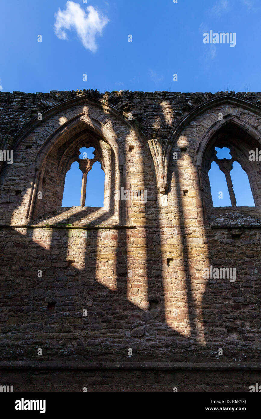 The ruined arched windows of Tintern Abbey, Monmouthshire, Wales Stock ...