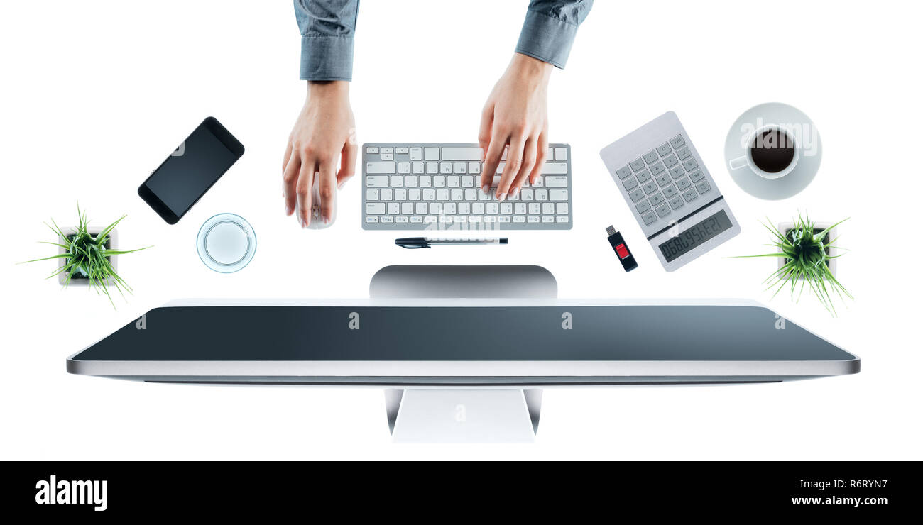 Business woman working at office desk Stock Photo - Alamy