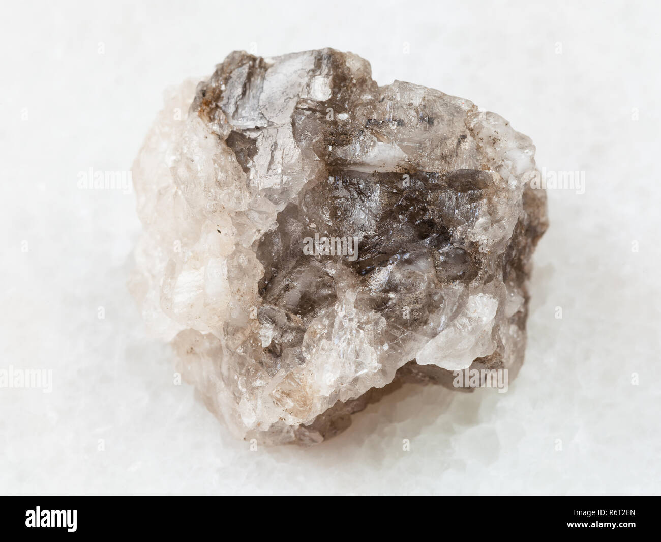 raw Halite (rock salt) stone on white marble Stock Photo - Alamy