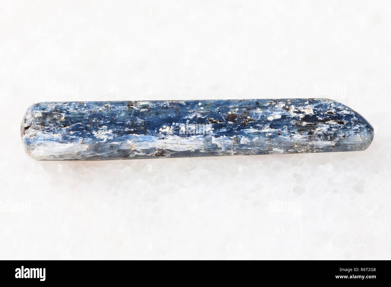 polished Kyanite crystal gemstone on white marble Stock Photo - Alamy