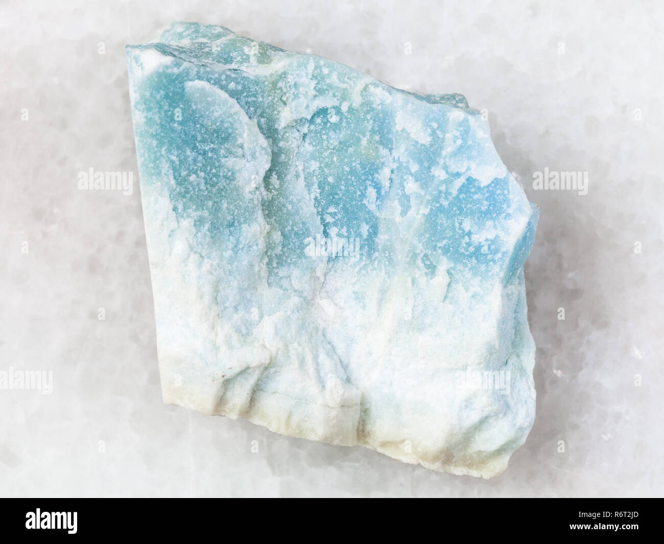 raw blue Violane stone on white Stock Photo - Alamy