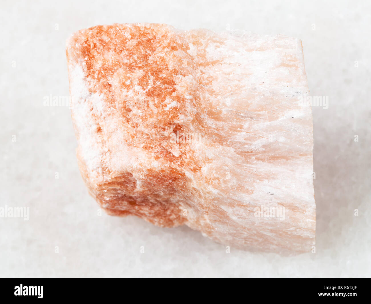 raw Selenite stone on white marble Stock Photo - Alamy