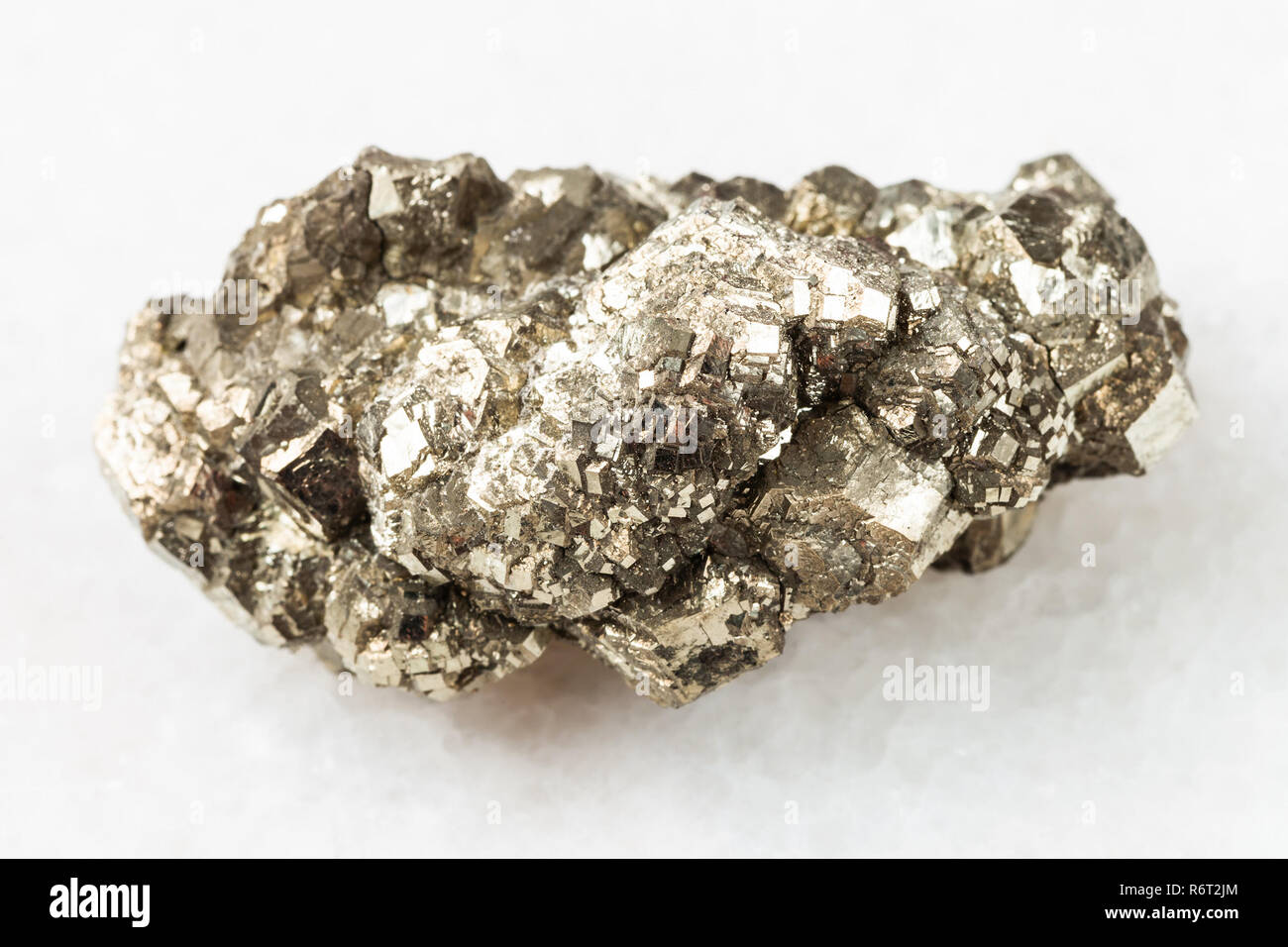 rough marcasite stone (white iron pyrite) on white Stock Photo - Alamy