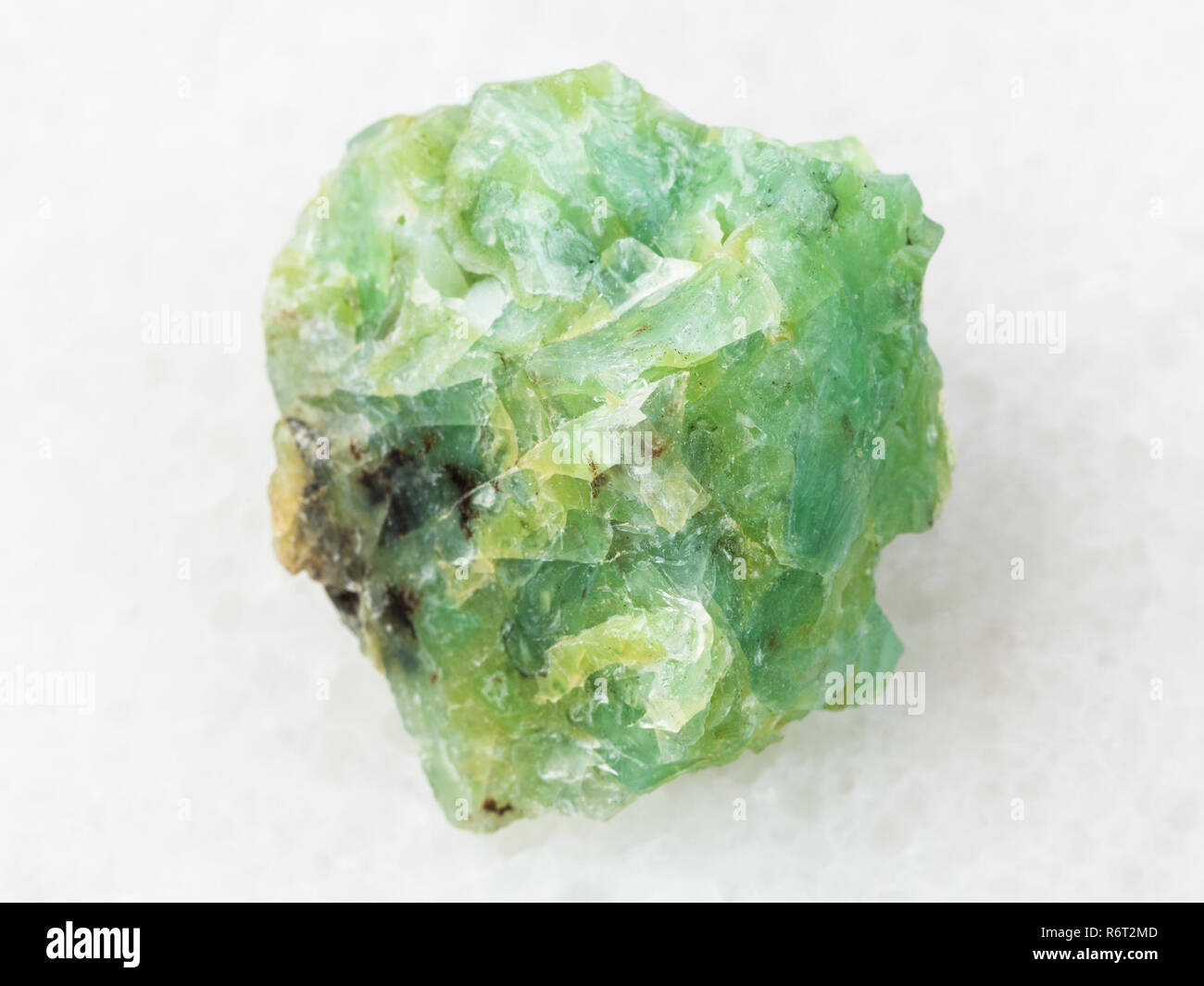 raw crystal of chrysopal gemstone on white Stock Photo - Alamy