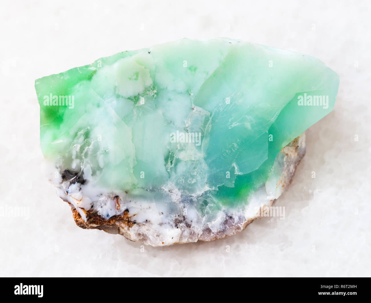 raw crystal of Chrysoprase gemstone on white Stock Photo - Alamy