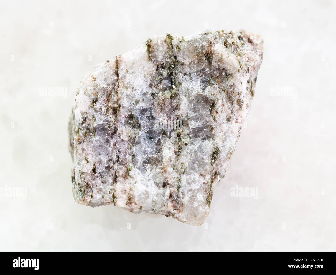 raw Apatite ( ore of phosphorus) stone on white Stock Photo - Alamy