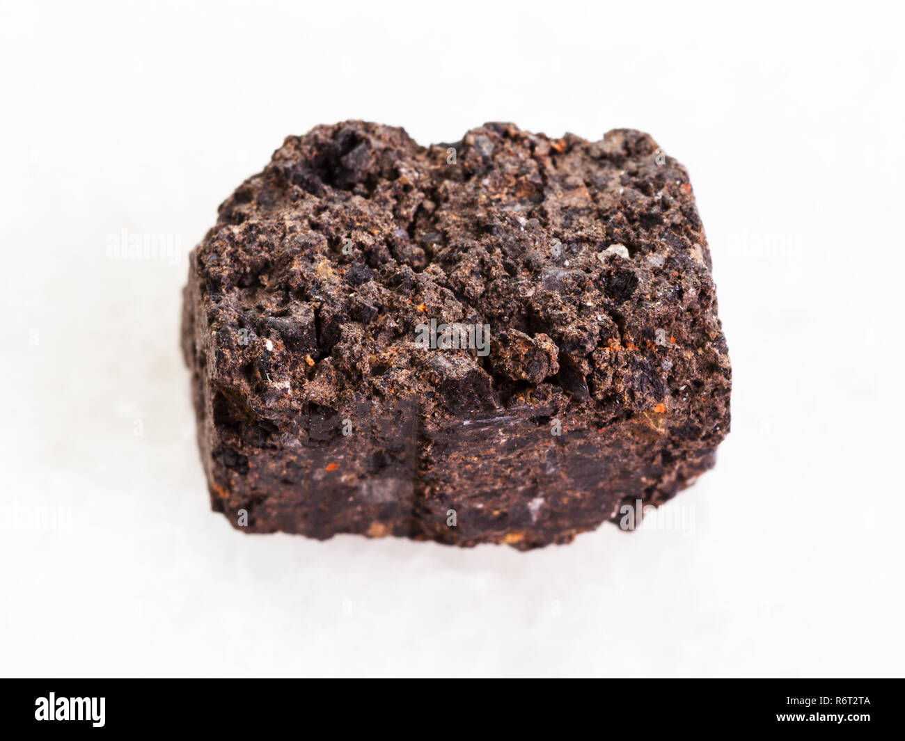 raw Peat Turf stone on white marble Stock Photo - Alamy