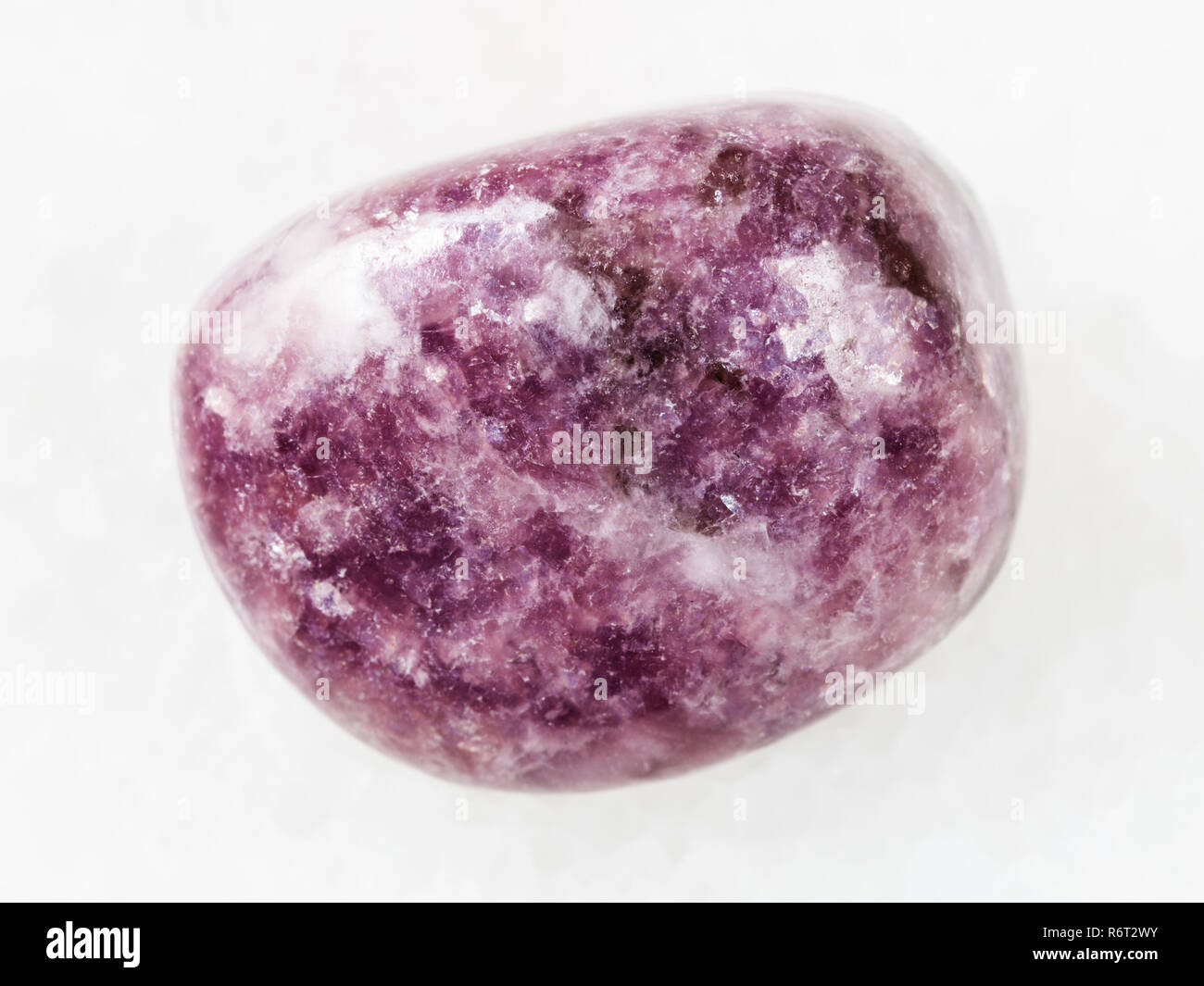 tumbled Lepidolite gemstone on white Stock Photo - Alamy