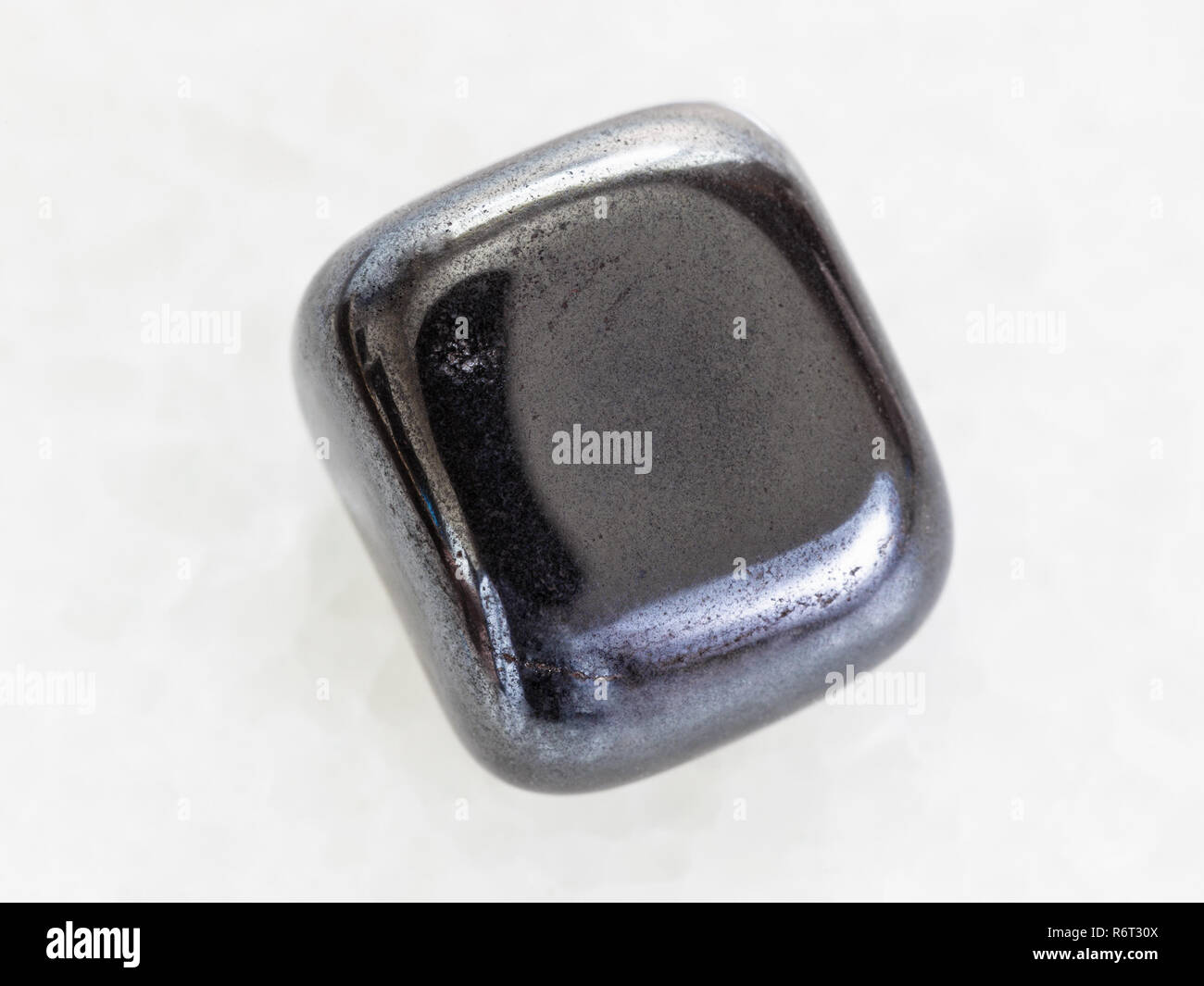 Black hematite pebble on stone hi-res stock photography and images - Alamy