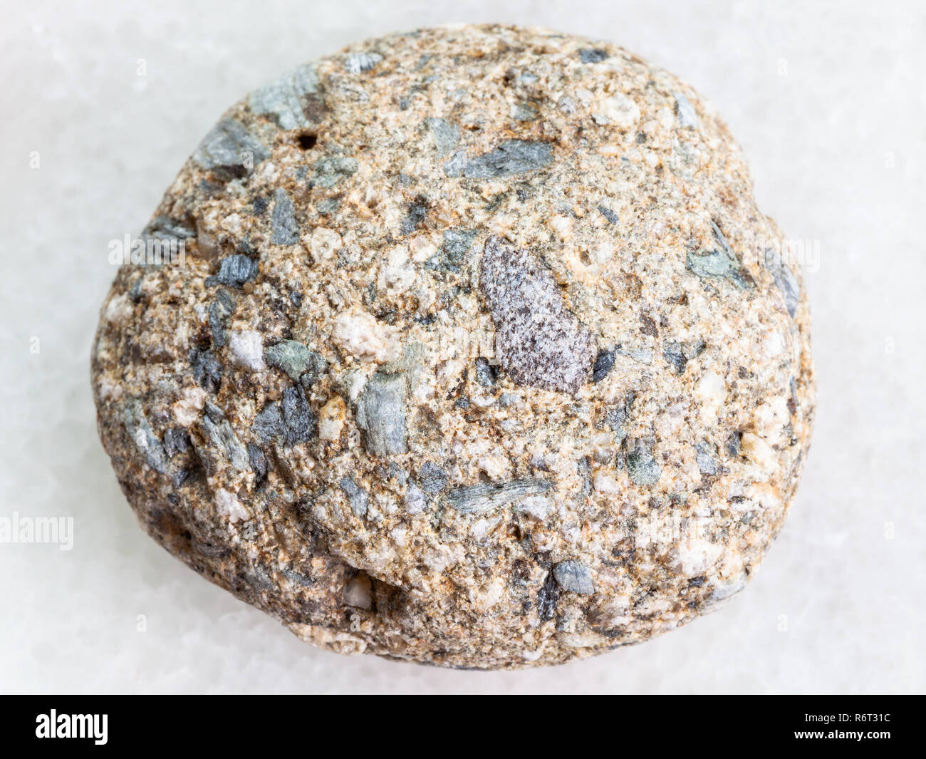 Arkose sandstone on white marble background Stock Photo - Alamy