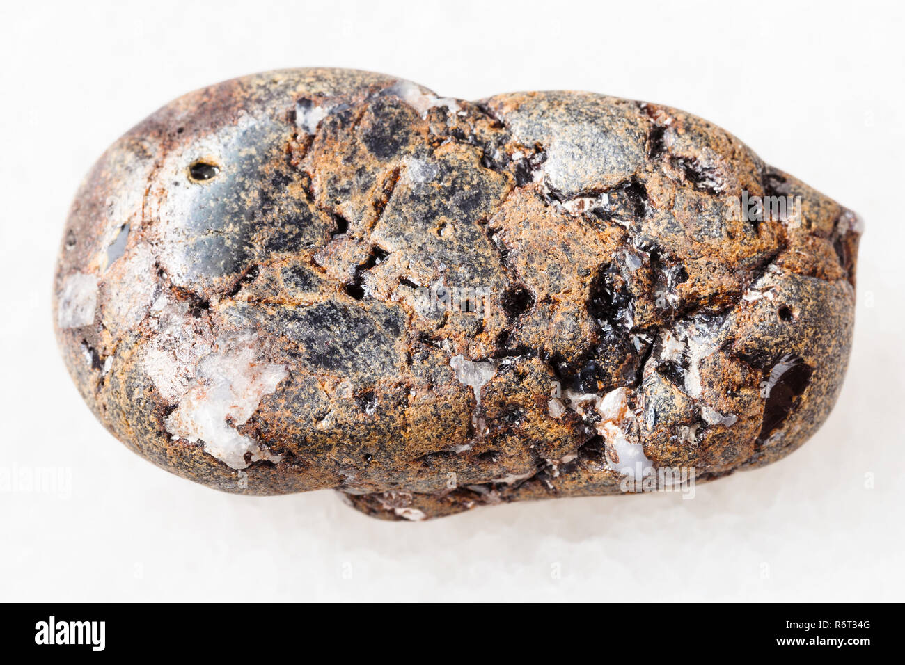 pebble of sphalerite stone with Galena on white Stock Photo - Alamy