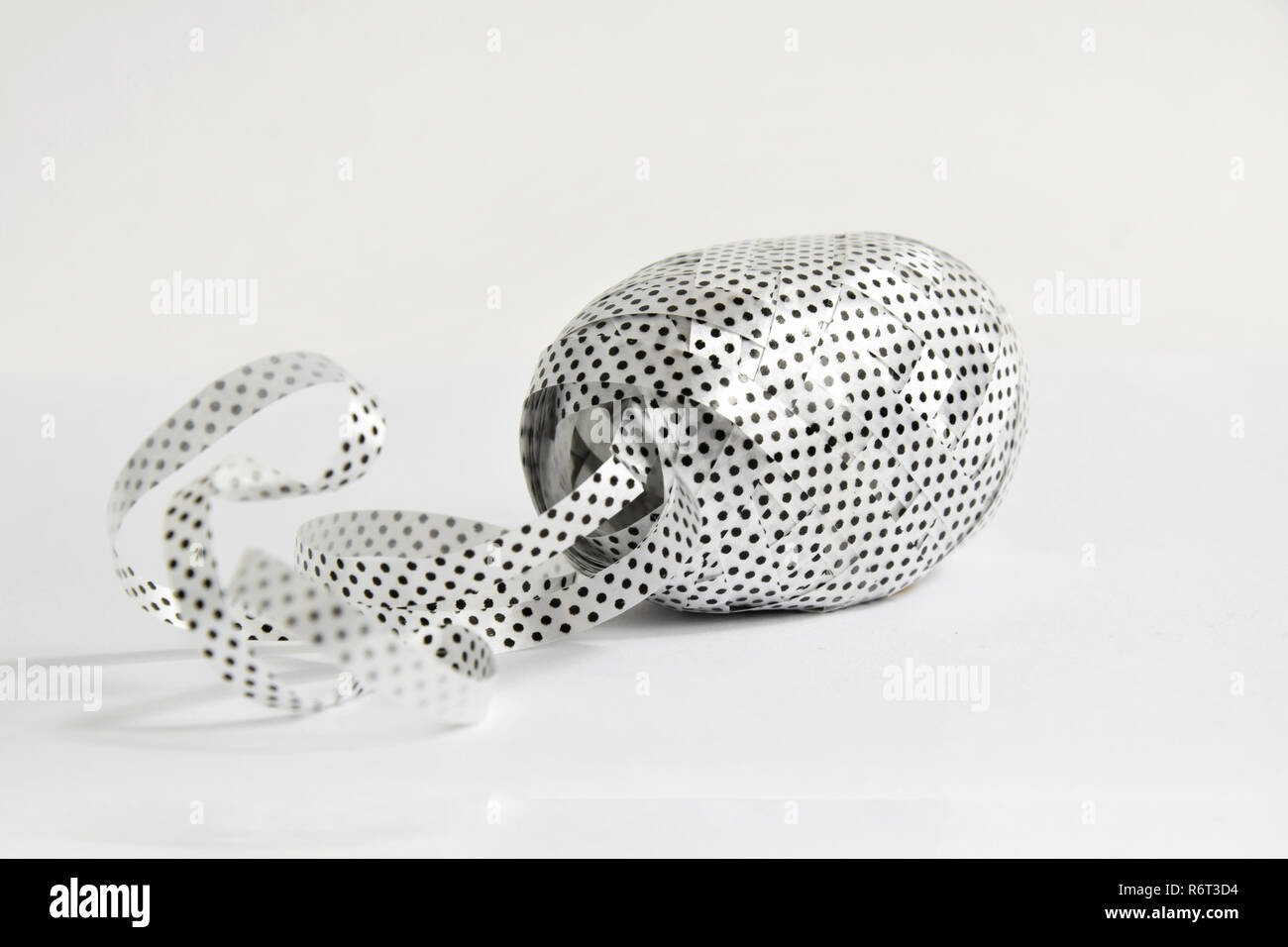 Curling Ribbon - Colorful gift wrapping band on white background Stock ...