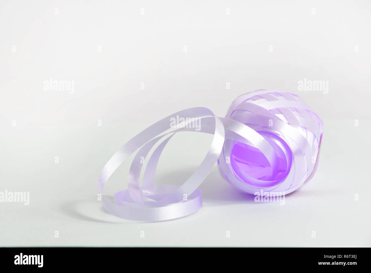 Curling Ribbon - Colorful gift wrapping band on white background Stock ...