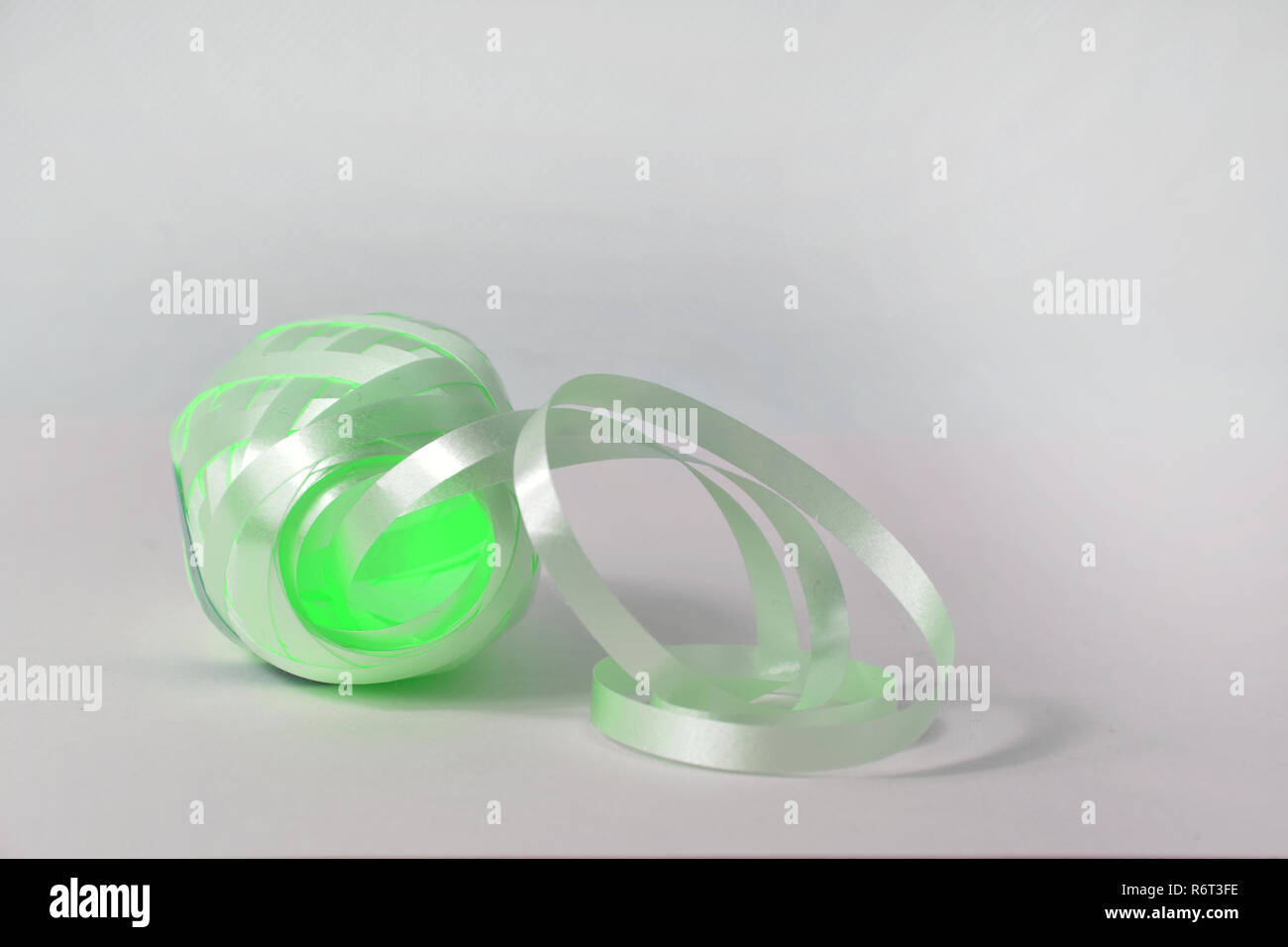 Curling Ribbon - Colorful gift wrapping band on white background Stock ...