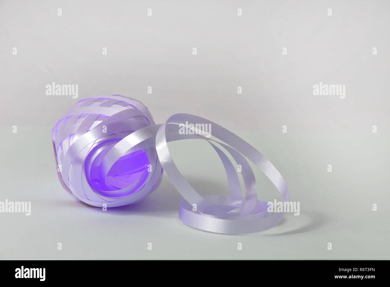 Curling Ribbon - Colorful gift wrapping band on white background Stock ...