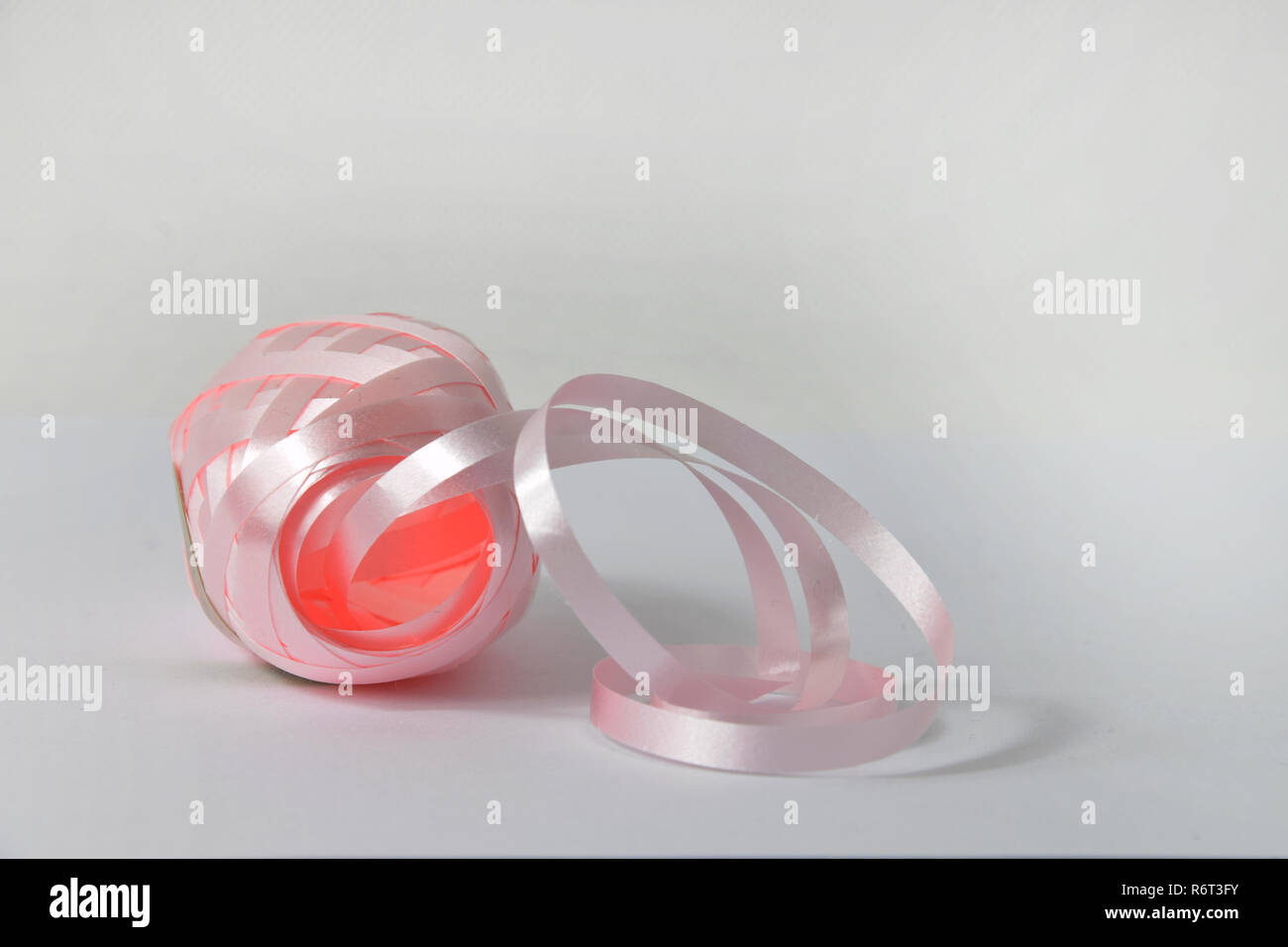 Curling Ribbon - Colorful gift wrapping band on white background Stock ...