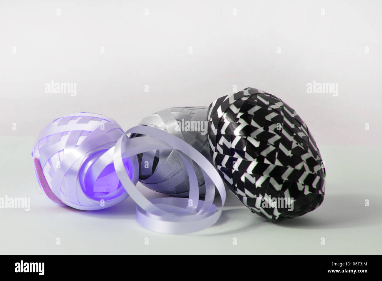 Curling Ribbon - Colorful gift wrapping band on white background Stock ...