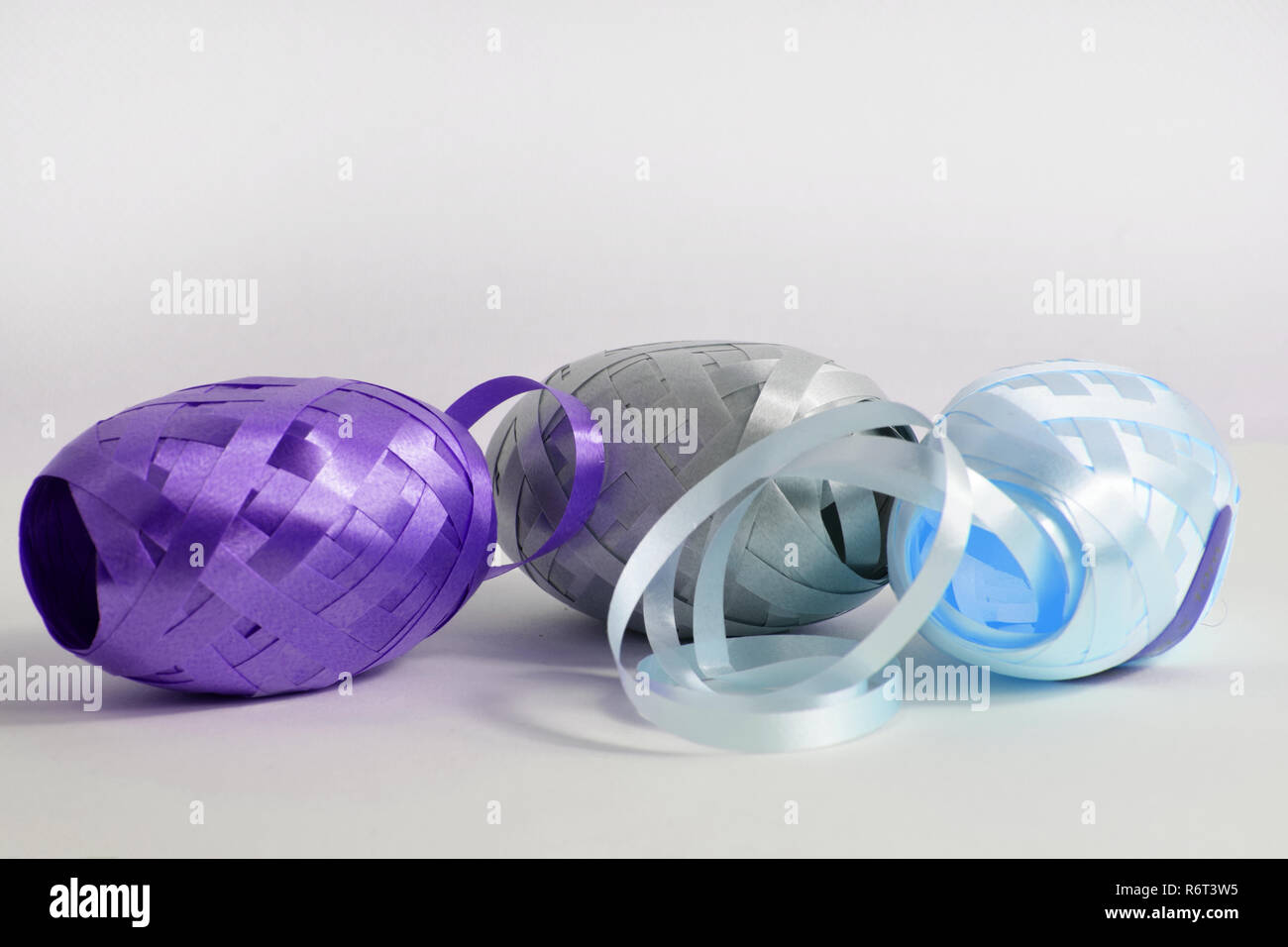 Curling Ribbon - Colorful gift wrapping band on white background Stock ...