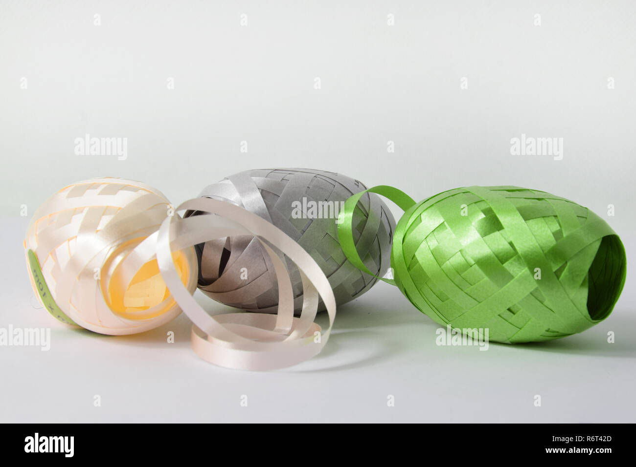 Curling Ribbon - Colorful gift wrapping band on white background Stock ...