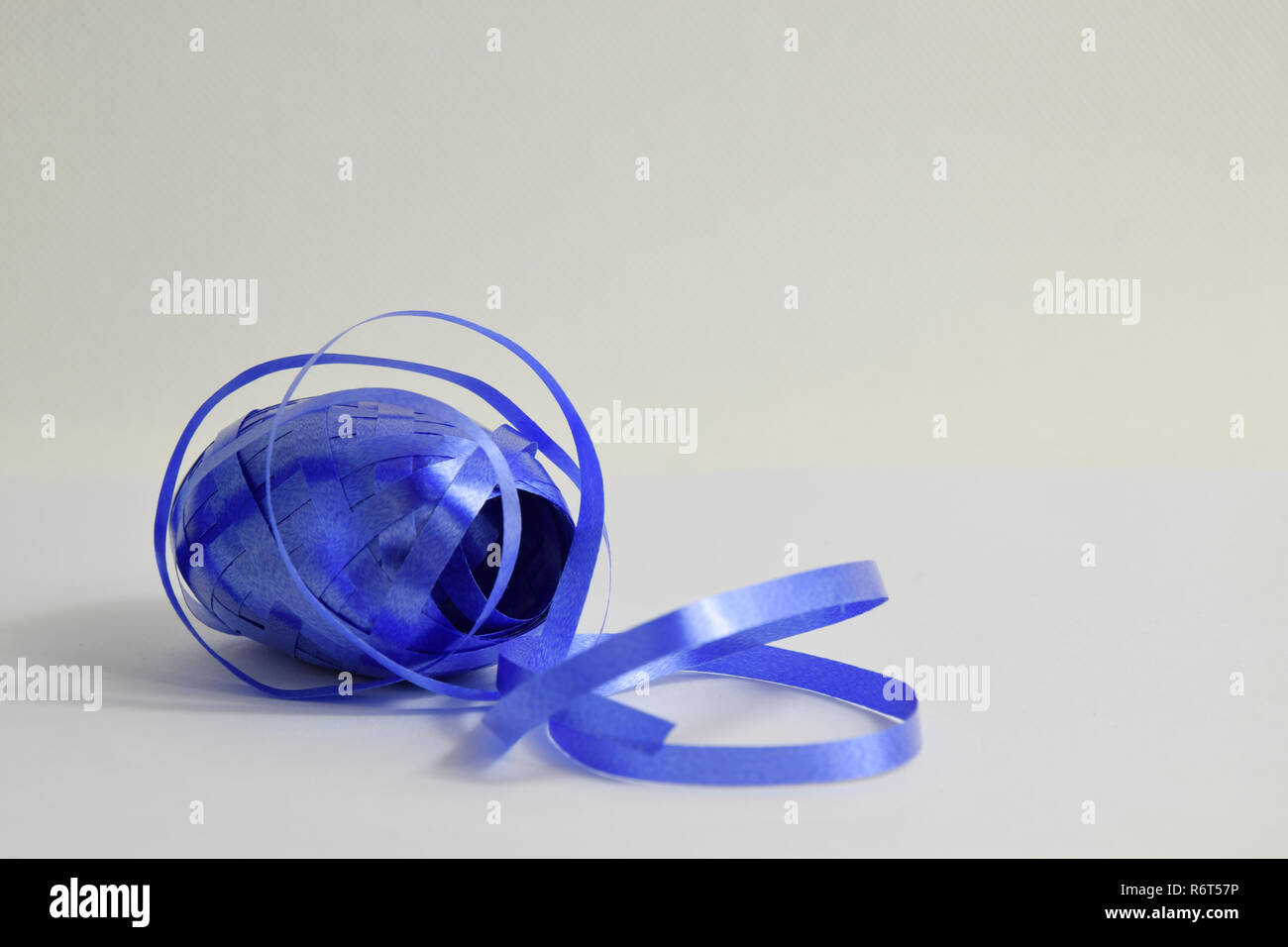 Curling Ribbon - Colorful gift wrapping band on white background Stock ...