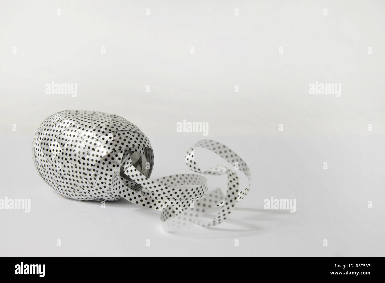 Curling Ribbon - Colorful gift wrapping band on white background Stock ...