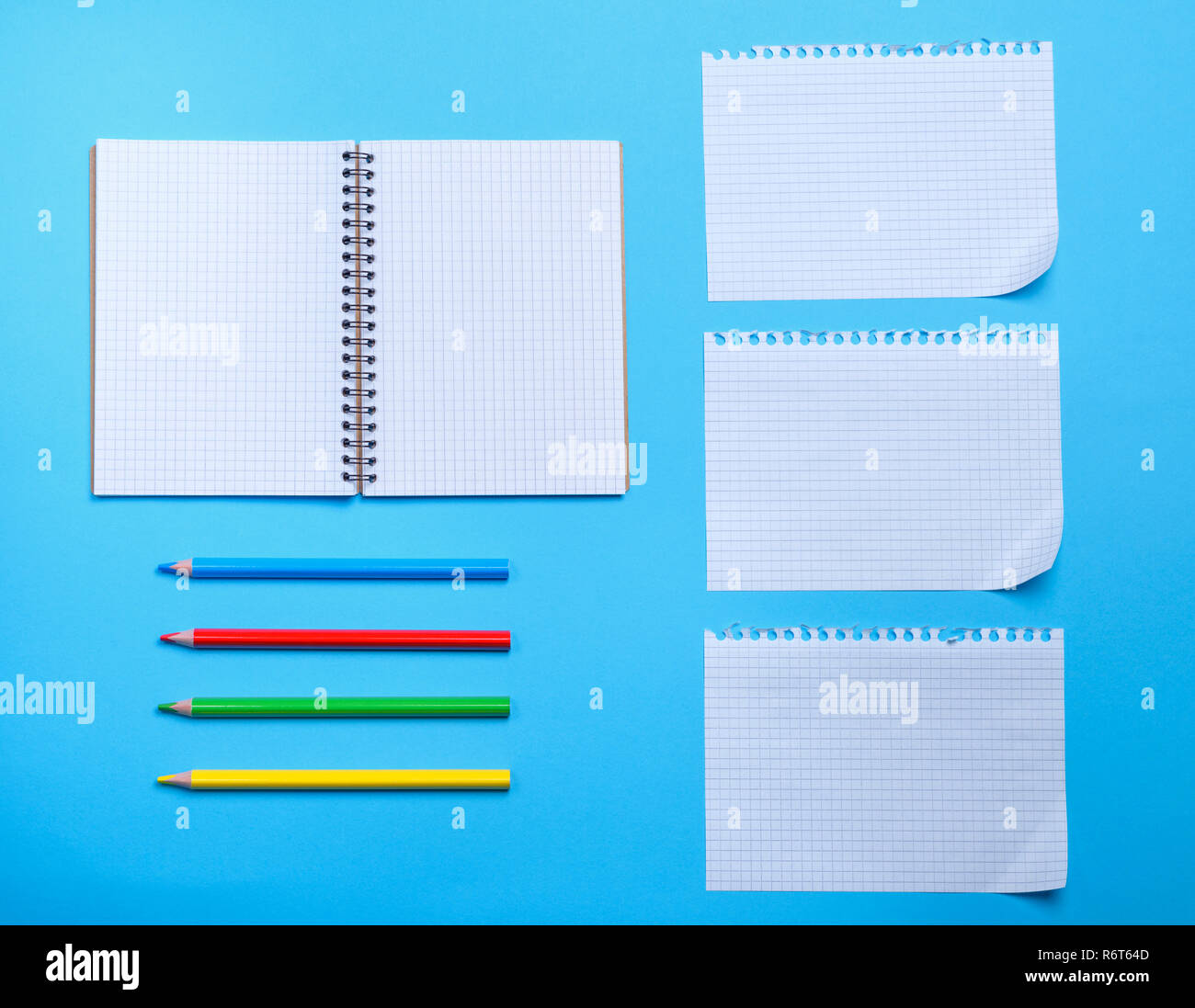 white blank sheet in a box from a notebook with holes Stock Photo - Alamy