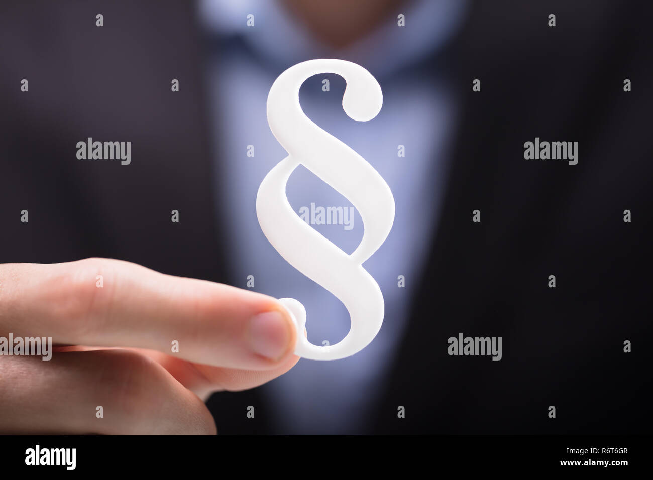 Person Holding Paragraph Symbol Stock Photo - Alamy