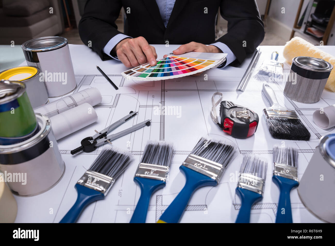 Architect's Hand Choosing Color From Swatch Stock Photo - Alamy