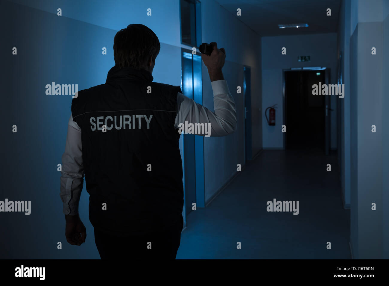Security guard checking door hi-res stock photography and images - Alamy
