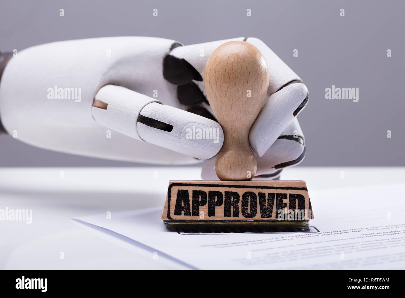 Robot Hand Approving Document Stock Photo - Alamy