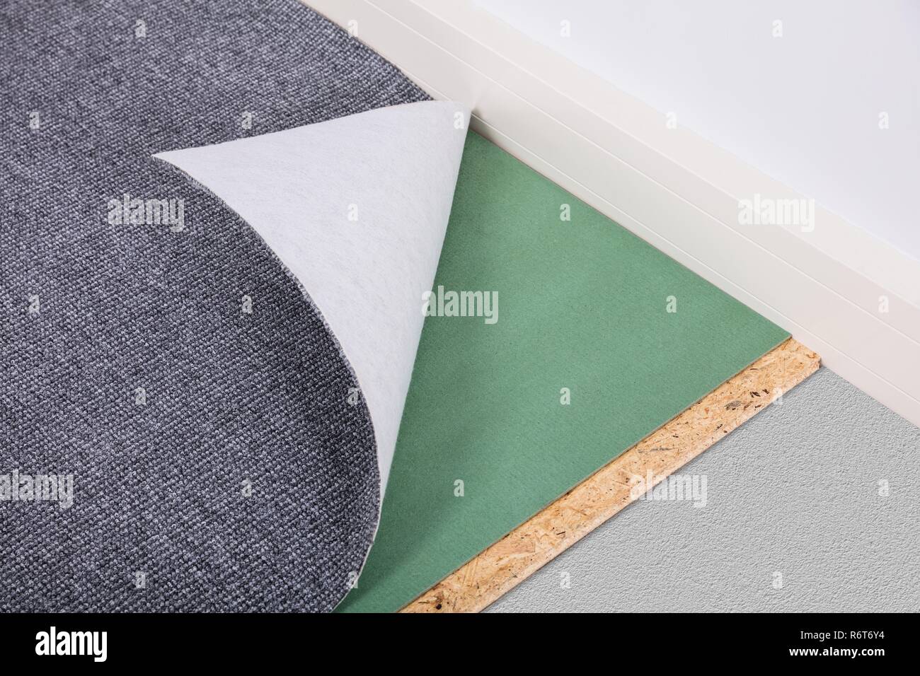 Close-up Of A Folded Carpet Stock Photo - Alamy