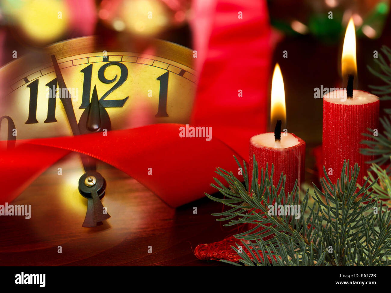 Clock face with needles before midnight Stock Photo - Alamy