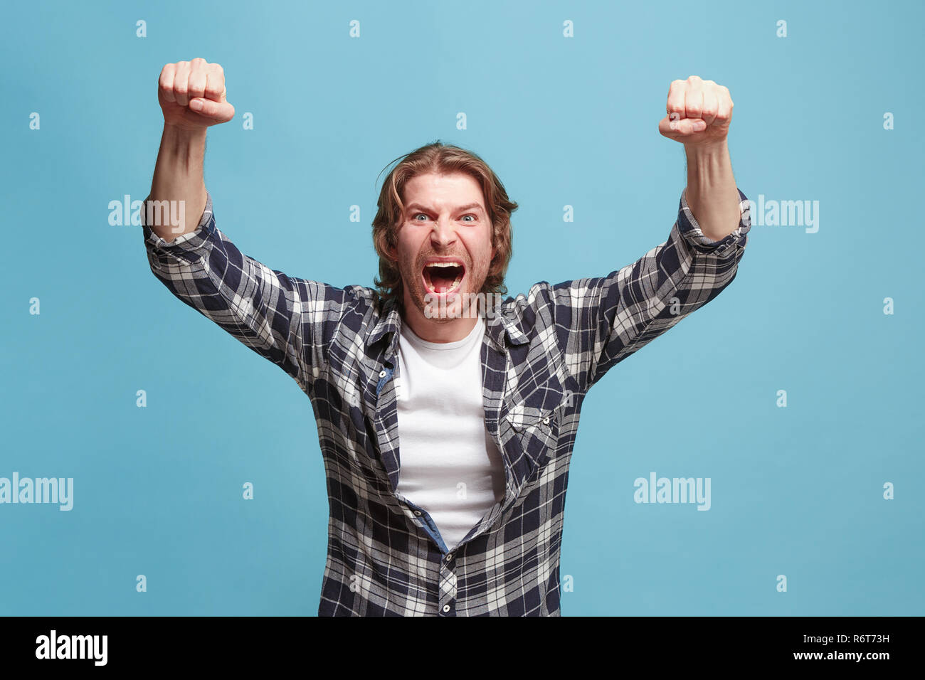 Winning success man happy ecstatic celebrating being a winner. Dynamic ...