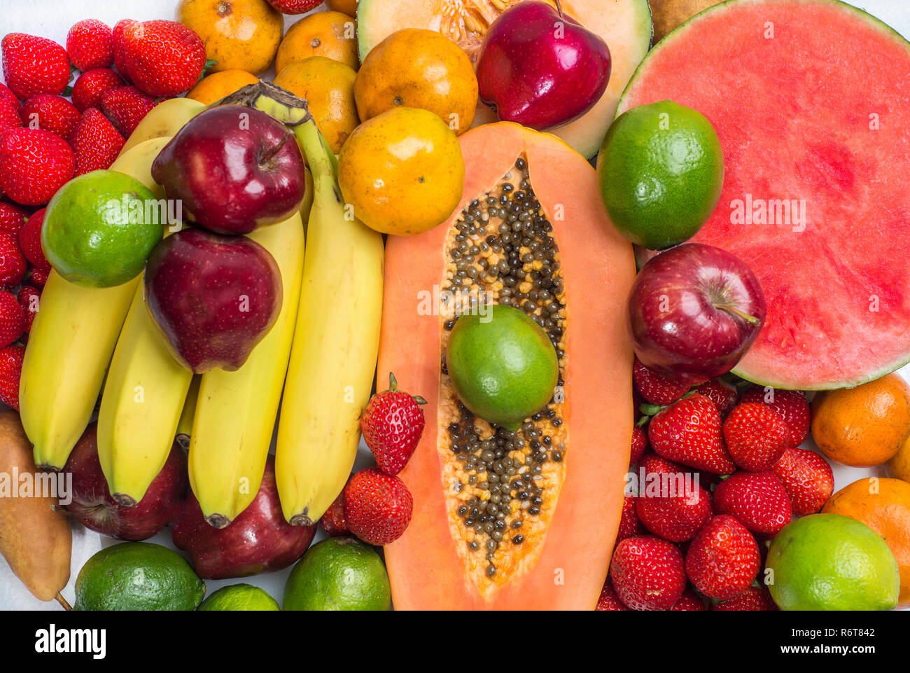 Top view of fruits in a white background for advertising purposing ...