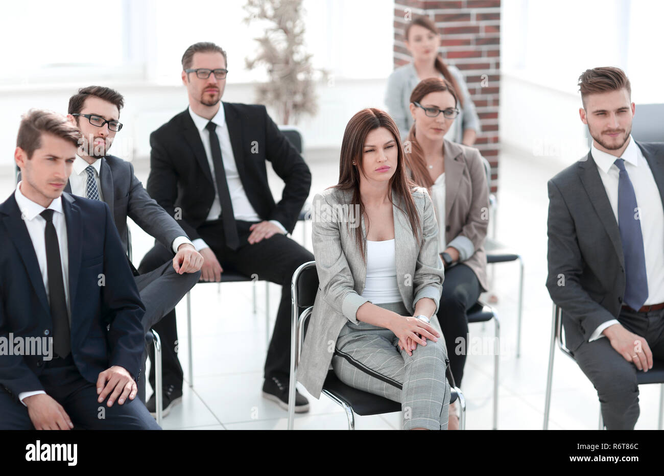 group of business people sitting in the meeting room Stock Photo - Alamy