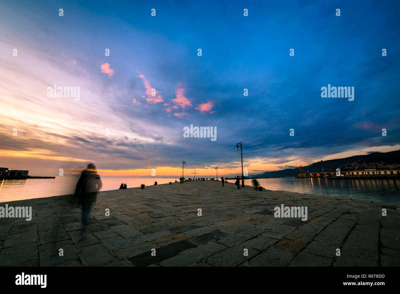 The Molo Audace pier of Trieste in a winter evening Stock Photo - Alamy