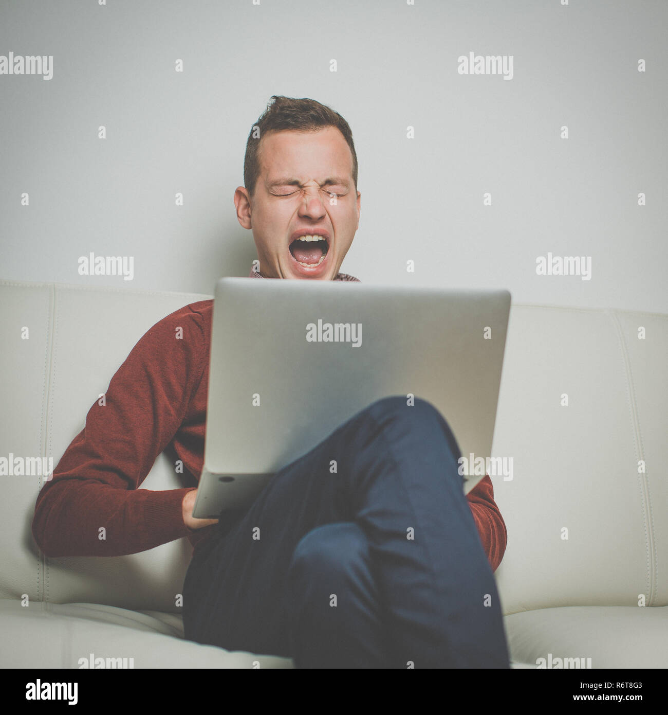 Guy sleeping on laptop hi-res stock photography and images - Alamy